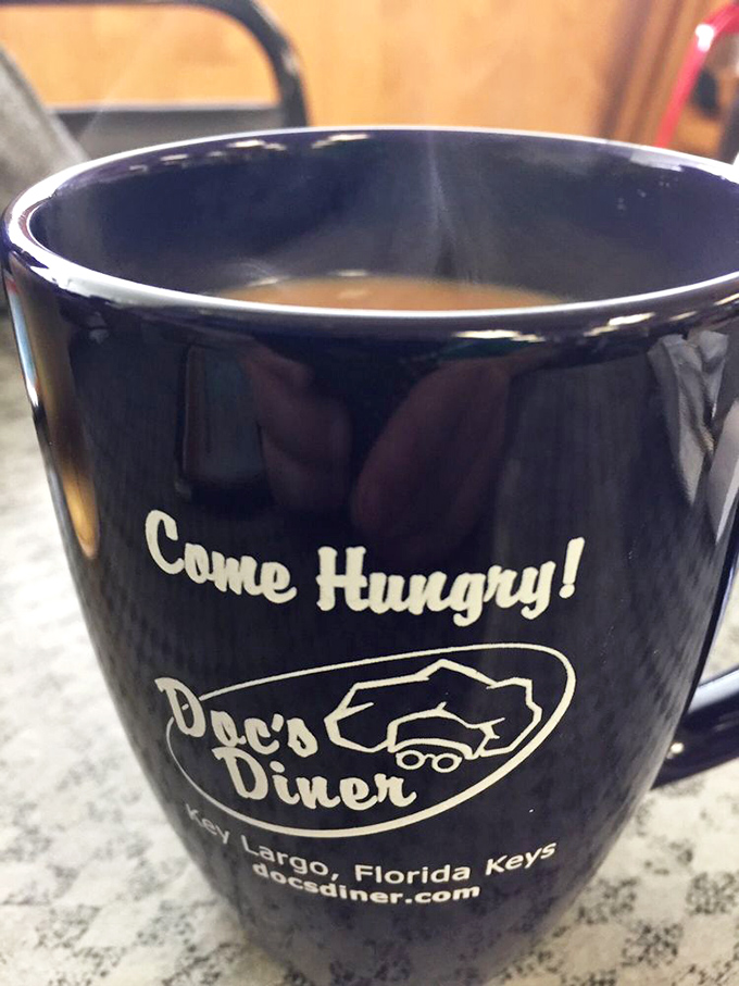 The "Come Hungry" mug isn't just a vessel for coffee &ndash; it's Doc's mission statement in ceramic form, promising satisfaction with every steaming sip.