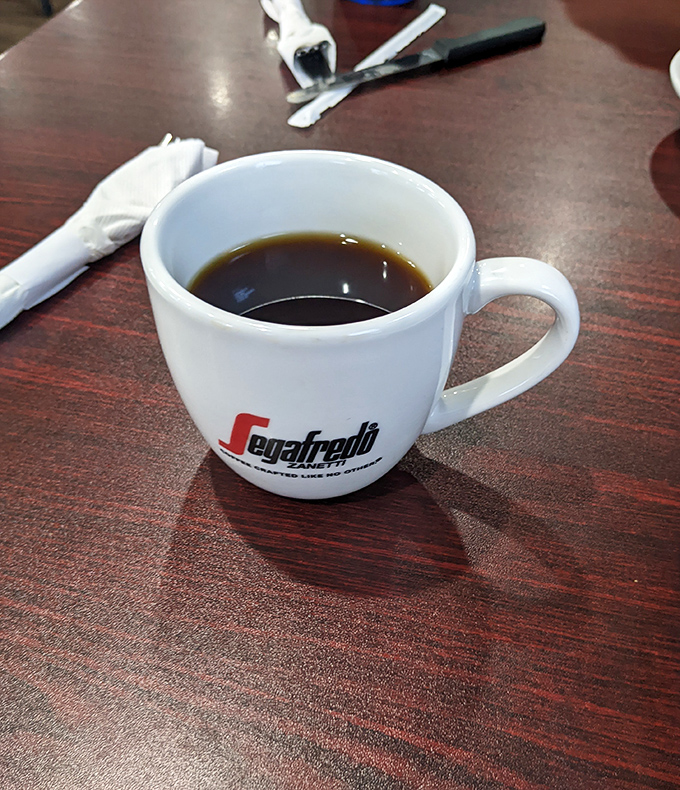 Coffee served in a mug that means business. No foam art needed when the brew itself is this honest-to-goodness perfect.