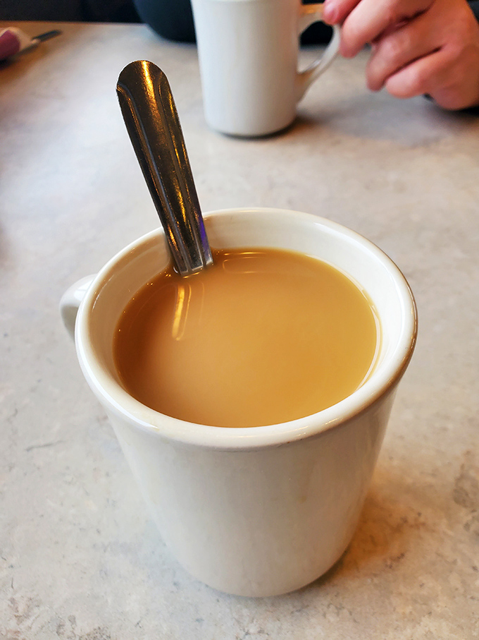 The humble diner coffee cup&mdash;civilization's most perfect vessel. Contains liquid motivation that keeps coming until you surrender or float away.