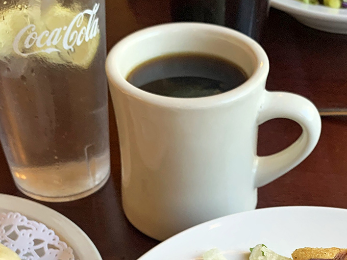 Even the coffee comes with a side of nostalgia, served in sturdy diner mugs that have witnessed countless conversations and comfort food moments.