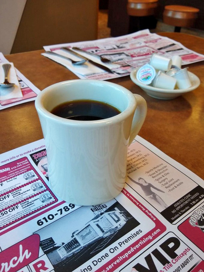 The humble white mug &ndash; diner coffee's natural habitat. Nothing fancy, just honest brew that promises to keep your eyelids functioning properly.