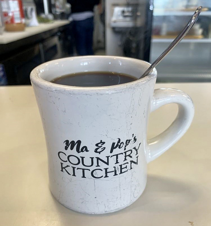 The humble diner mug&mdash;battle-scarred veteran of countless refills, proudly bearing the restaurant's name and promising liquid motivation for your day.