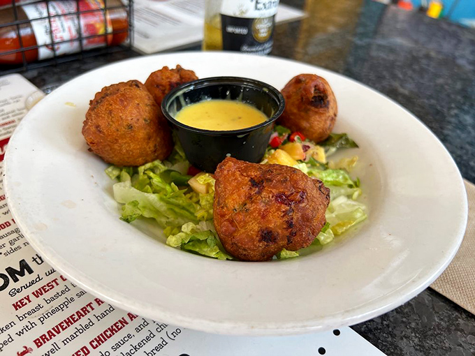 Conch fritters: golden-brown spheres of Caribbean-inspired goodness that make you wonder why you don't eat fried dough with seafood more often.