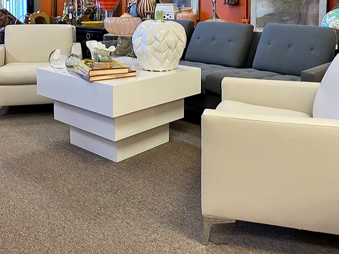Mid-century modern meets contemporary chic in the furniture section. These pristine white pieces aren't just furniture—they're conversation starters waiting to happen.