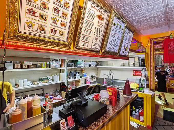 The counter where magic happens - where simple orders transform into extraordinary culinary experiences ahead.