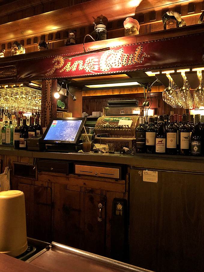 The vintage cash register behind the bar isn't just decoration&mdash;it's a reminder that some traditions, like paying with actual cash, never go out of style.