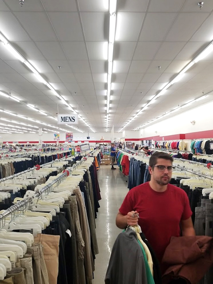 Treasure hunters in their natural habitat. The thrill of the find is written across every shopper's face in this bargain wilderness.