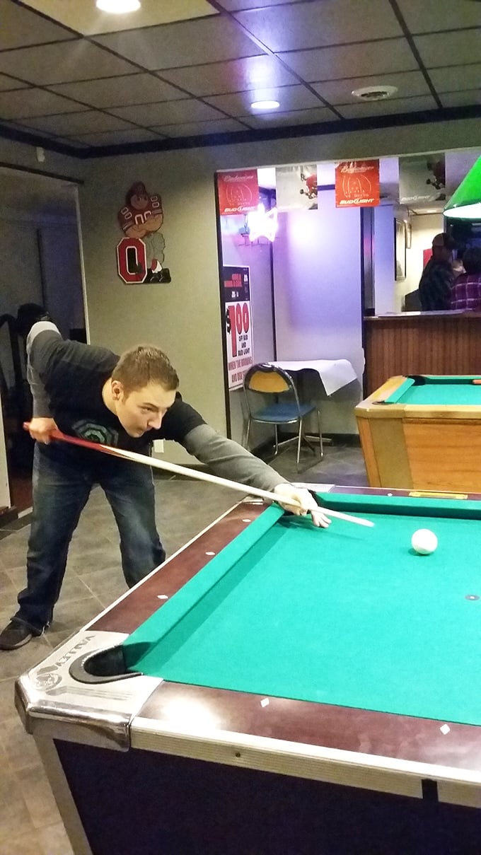 Pool sharks and burger enthusiasts find common ground at Backroom, where friendly competition works up an appetite only their menu can satisfy.