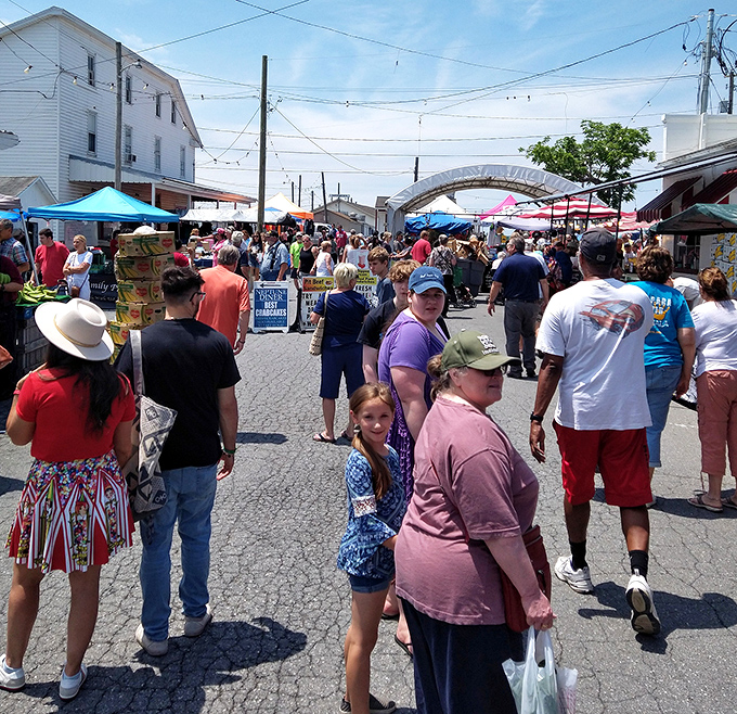 Market magic in motion! The bustling outdoor section of Root's brings together locals and visitors under the universal language of bargain hunting. 