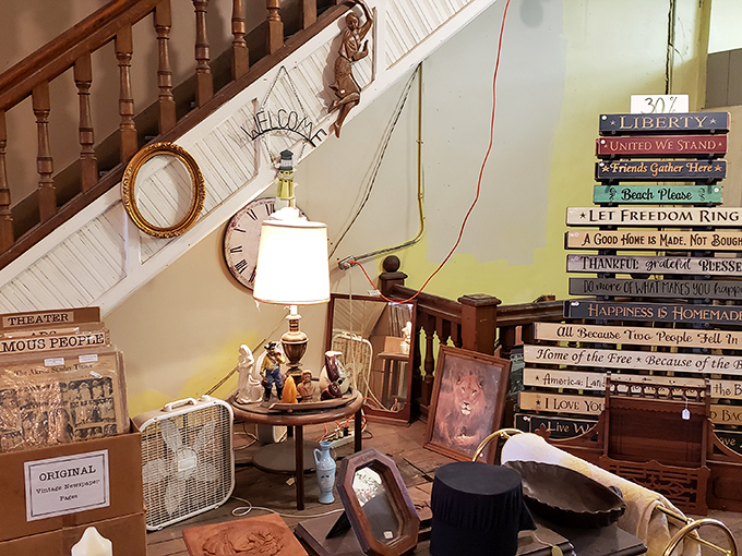 Americana on display: where patriotic signs meet vintage decor in a corner that practically hums "This Land Is Your Land."
