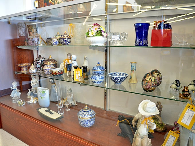 The curio cabinet&mdash;where collectibles large and small await adoption. That blue and white porcelain has "sophisticated beach house" written all over it.