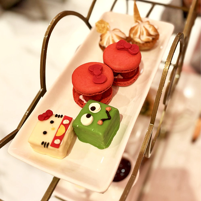 Dessert tier or art installation? These character-themed treats transform afternoon tea into a whimsical gallery opening where eating the exhibits is encouraged.
