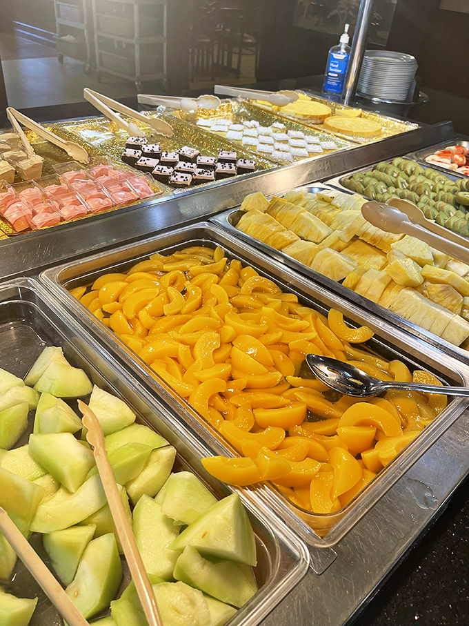 Fresh fruit and desserts: where the "I'll just have a light ending" promise goes to die beneath mountains of honeydew, pineapple, and mandarin oranges.