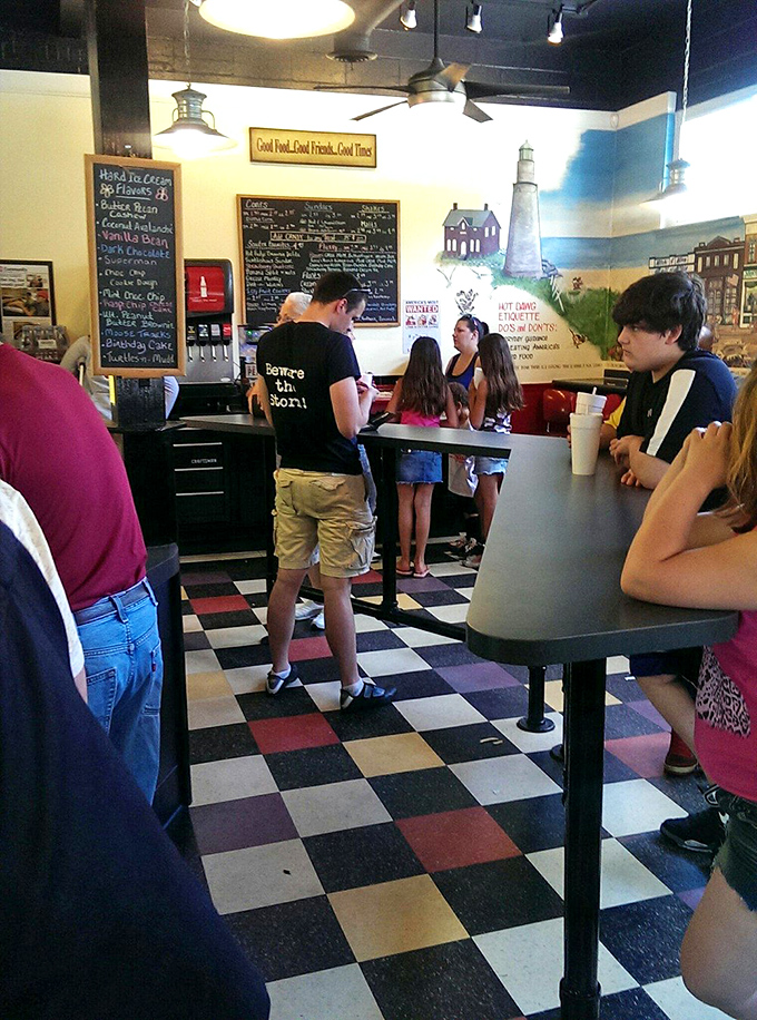 Families gather around checkered floors where memories are made one bite at a time.