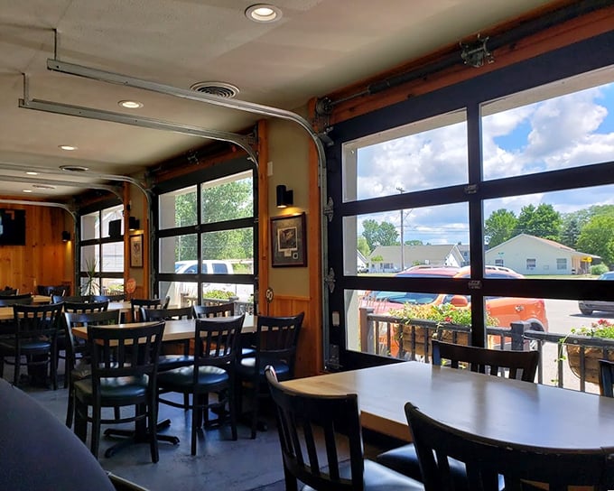 Garage doors that roll up during summer months create an indoor-outdoor space where the northern Michigan breeze enhances every bite.