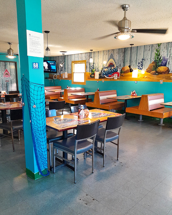 Fishing nets and weathered wood paneling create the perfect backdrop for seafood feasting. Like dining in the captain's quarters of a tasteful trawler.