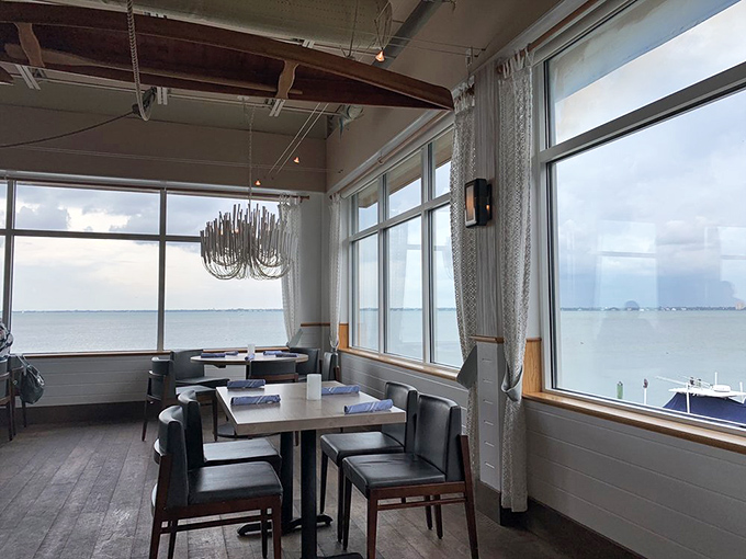 The dining room where calories don't count because you're too busy watching boats glide by on Sarasota Bay.