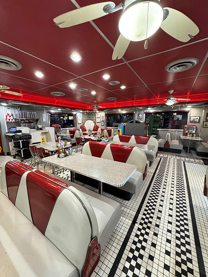The empty dining room waits expectantly like a theater before showtime. Soon these booths will witness first dates, family reunions, and perfect hash browns.
