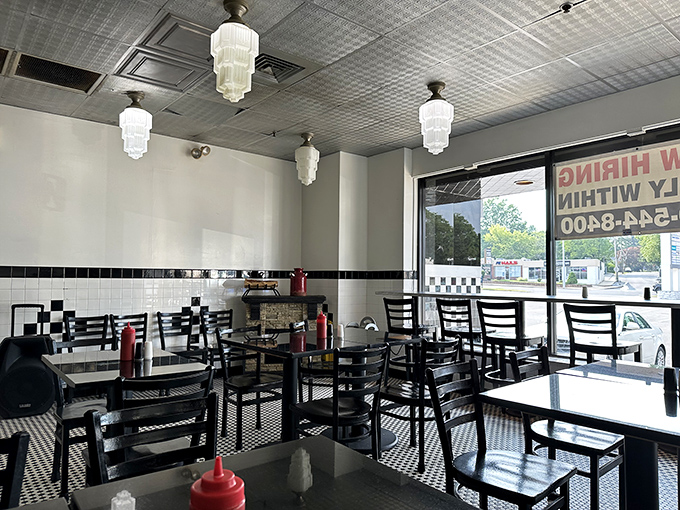 The dining area invites you to sit and savor rather than rush. Those pendant lights have witnessed countless "first bite" moments of pure joy.