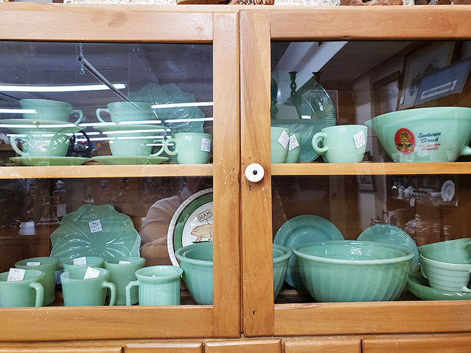 Jadeite dishware gleaming behind glass&mdash;proof that our grandparents understood the Instagram-worthy aesthetic long before filters were invented.