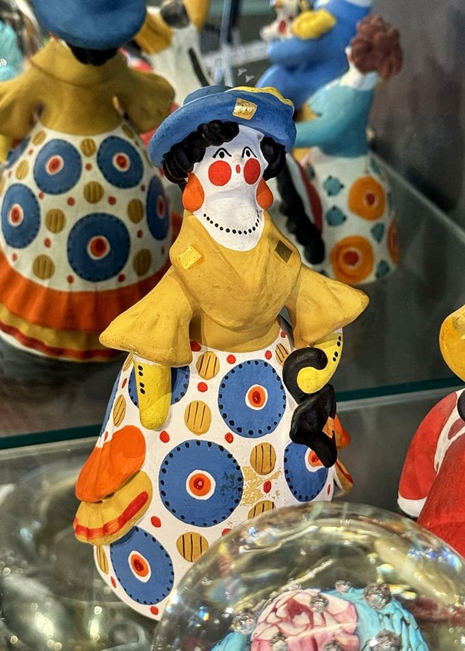 This whimsical polka-dotted figurine isn't just decoration&mdash;it's the conversation starter your bookshelf has been desperately waiting for.