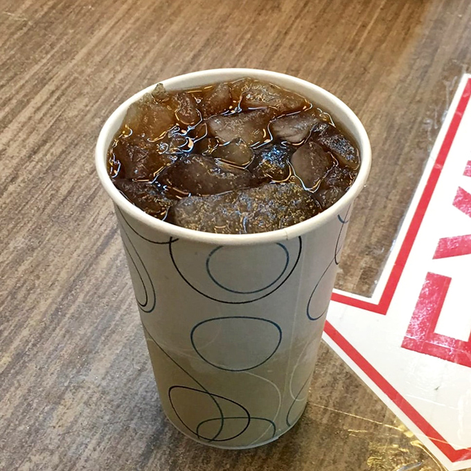 That root beer isn't just a drink, it's liquid nostalgia in a cup. Dark, frothy, and with enough personality to make mass-produced sodas weep with inadequacy.