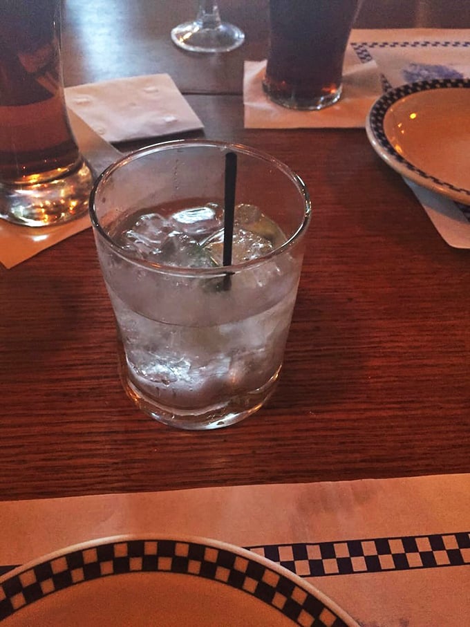Simple pleasures: a perfectly mixed cocktail waiting patiently while you debate between walleye and that New York Strip.