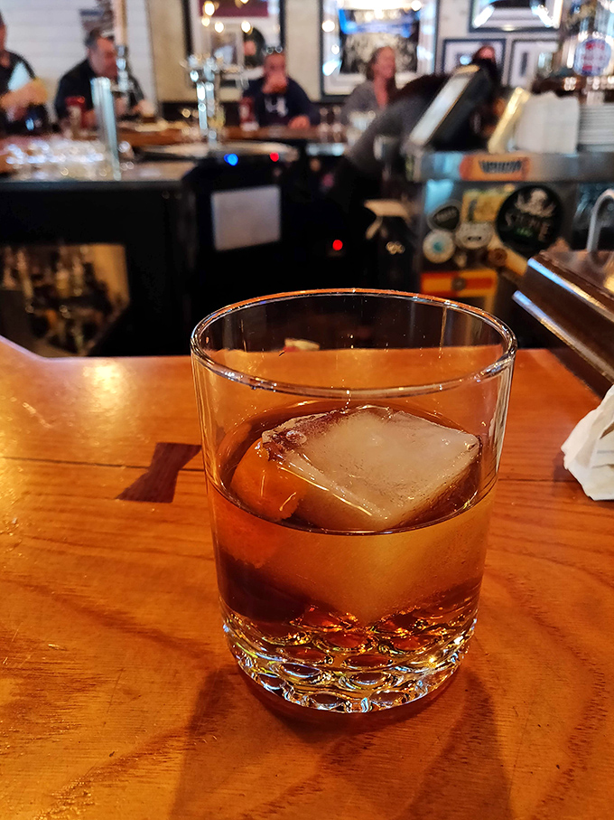 A perfectly poured whiskey with one substantial ice cube &ndash; civilization's answer to Monday meetings, traffic jams, and smartphone updates.