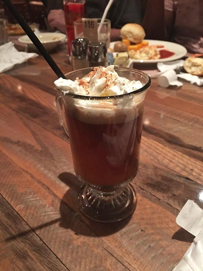 Rich chocolate drink topped with whipped cream: liquid comfort in a glass that adults deserve too.