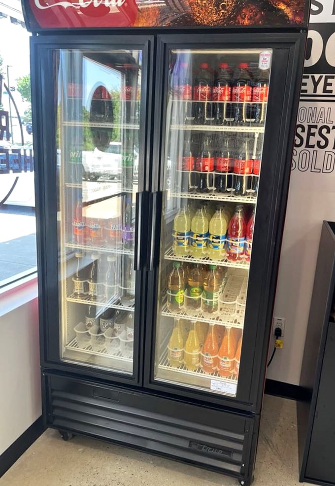 The drink cooler stands ready, like a loyal sidekick to your sandwich superhero. Because every great cheesesteak deserves a worthy beverage companion.