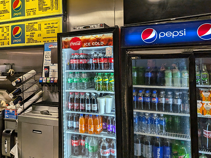 The drink cooler&mdash;where decisions about which soda pairs best with your pizza become surprisingly important philosophical questions.