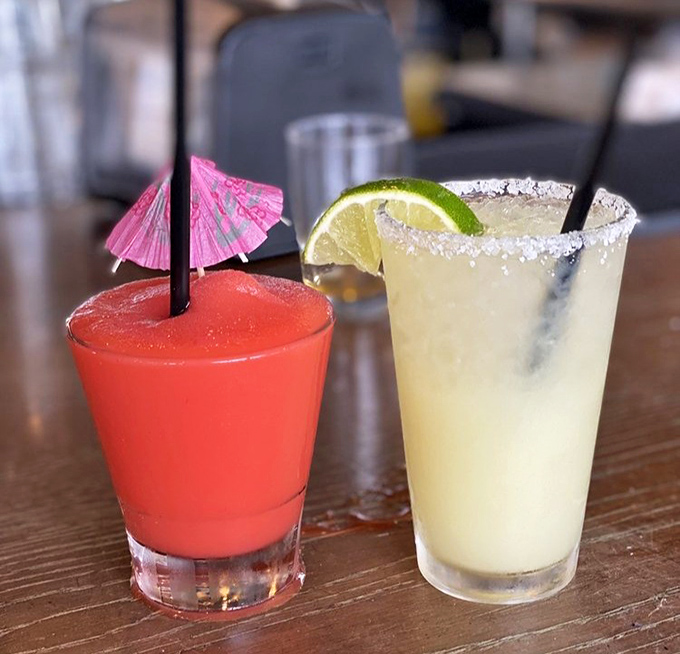 Frozen cocktails that don't apologize for being fun. One sip of these colorful concoctions, and suddenly the Carolina heat doesn't seem so bad.