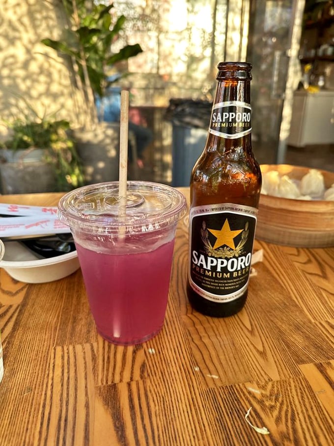 Nothing complements a feast like a Sapporo and something bright purple. When your drink matches the wall color, you know you're fully committed to the experience.
