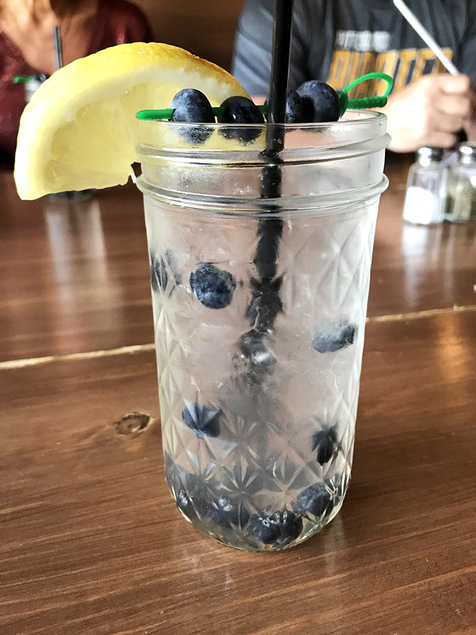 A mason jar cocktail that's both refreshing and photogenic&mdash;blueberries and lemon creating that perfect summer in a glass experience.