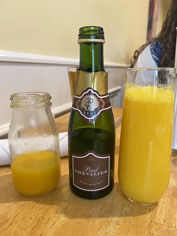 Mimosa ingredients arranged like a DIY happiness kit—because sometimes breakfast calls for a little sparkle in your orange juice.