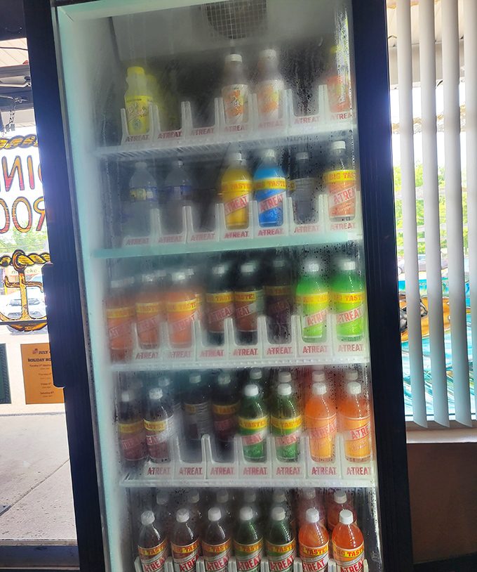 The beverage cooler offers colorful refreshment options. Because nothing complements fried seafood quite like an ice-cold soda.