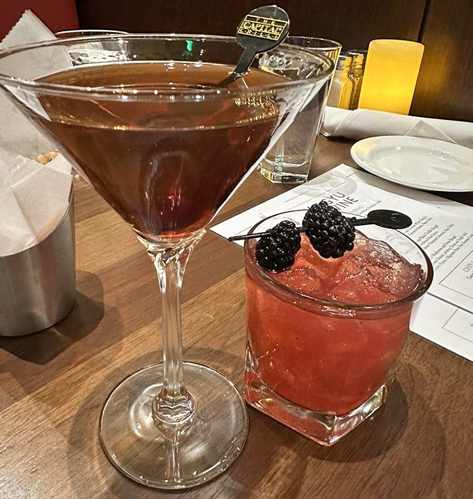 Cocktails that dress better than most people. That blackberry garnish isn't just for show&mdash;it's the exclamation point on liquid poetry.