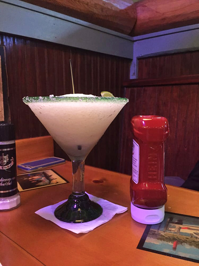 A margarita with a green sugar rim that says, "Yes, I'm on vacation, even if I only drove 20 minutes to get here."