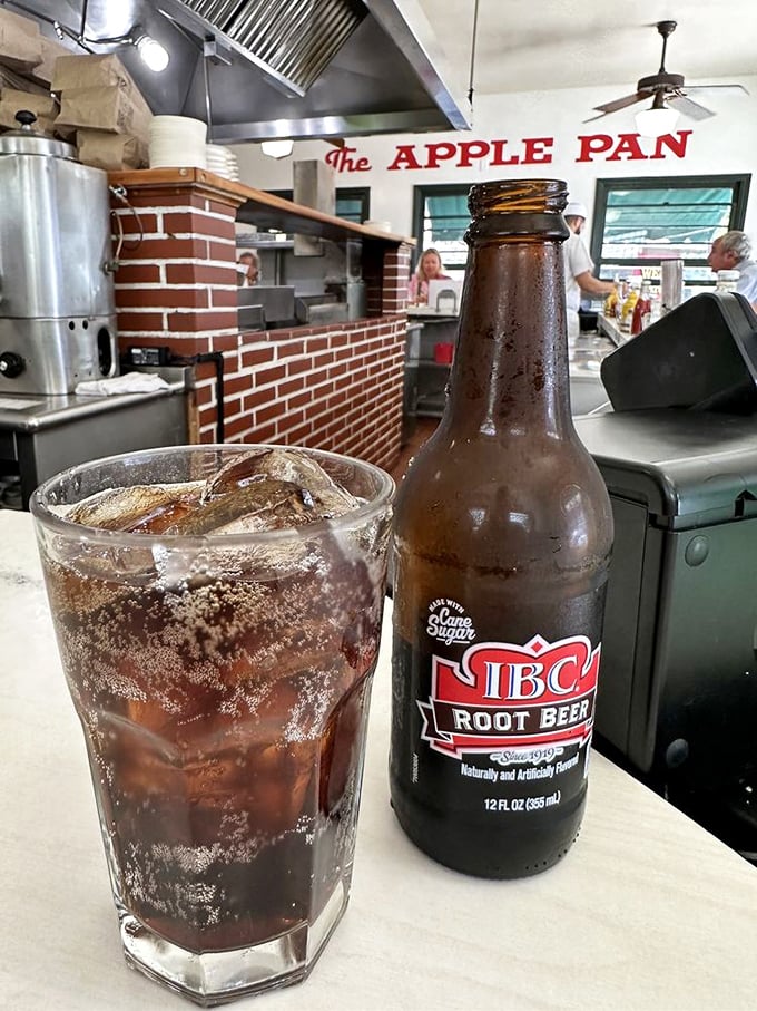 That IBC root beer hits differently at The Apple Pan &ndash; maybe it's the classic bottle, maybe it's the surroundings, or maybe some pleasures really are timeless.