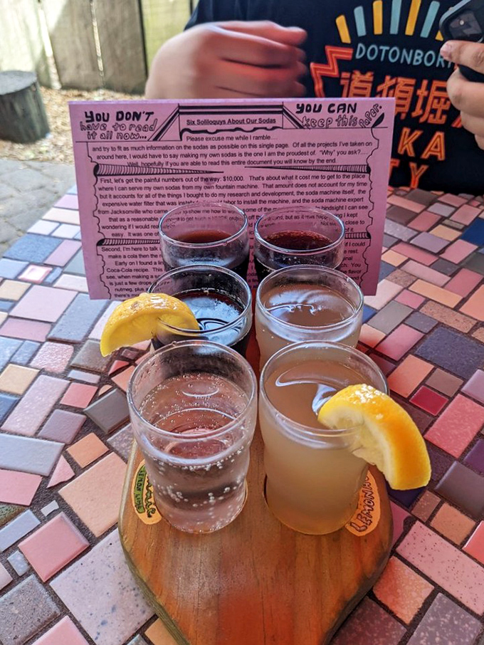 The soda flight arrives with its own manifesto&mdash;because at Satchel's, even the beverages come with a side of philosophy and wit.