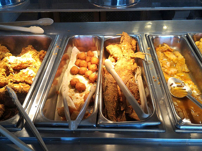 The buffet line: where decision-making becomes an Olympic sport. Those hush puppies are calling my name!