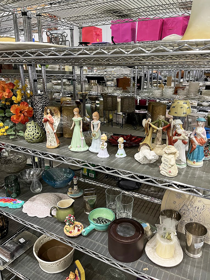 Porcelain figurines stand in silent judgment, waiting for someone to rescue them from this shelf of misfit collectibles and forgotten heirlooms.