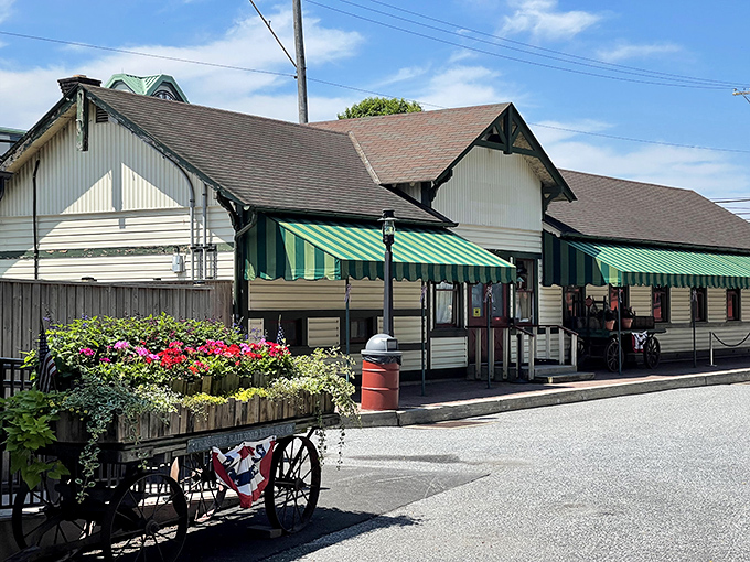Spring blooms frame the railway like nature's own welcome mat, promising scenic delights around every gentle curve ahead.