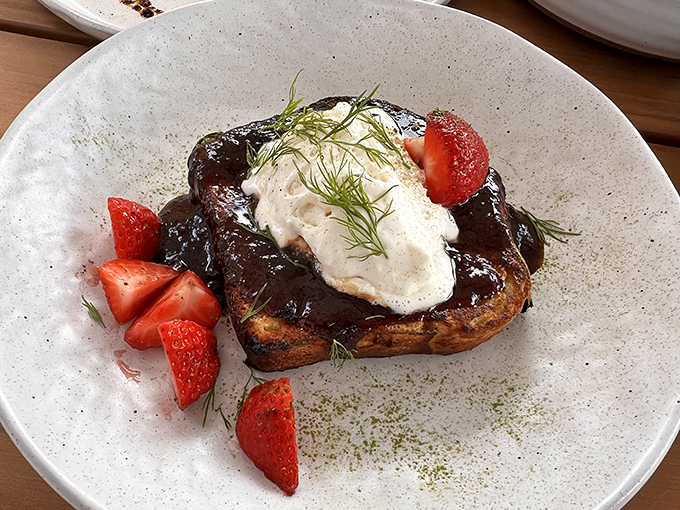 French toast that's had a Mexican vacation and came back transformed. The strawberries are just showing off at this point.