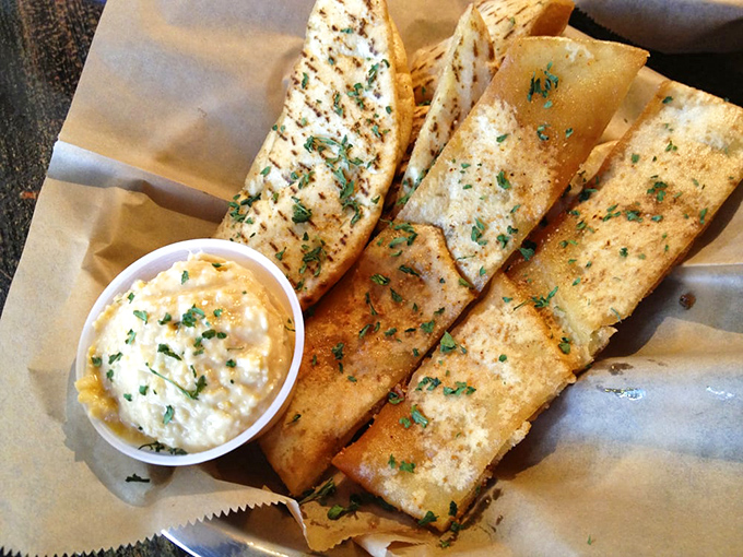 Fried pita strips with tzatziki &ndash; the Mediterranean answer to chips and dip that'll make you wonder why you ever settled for tortilla chips.