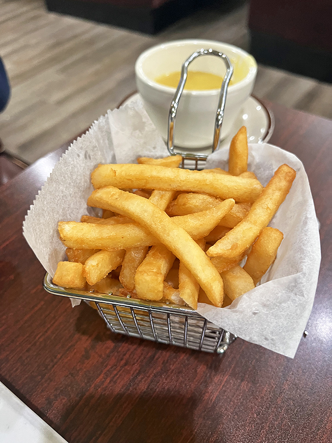 These golden fries aren't just a side&mdash;they're the supporting actors that sometimes steal the whole show. Crispy, hot, and unapologetically perfect.