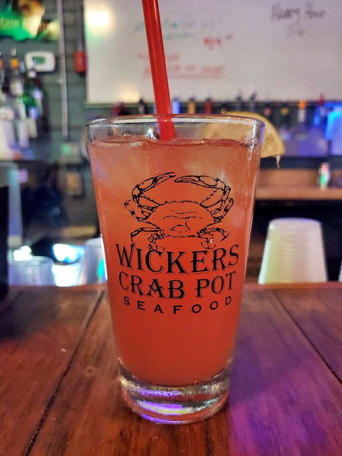 A signature Wicker's drink in its natural habitat&mdash;waiting to wash down whatever seafood treasure you've chosen. That crab logo is basically a quality seal.