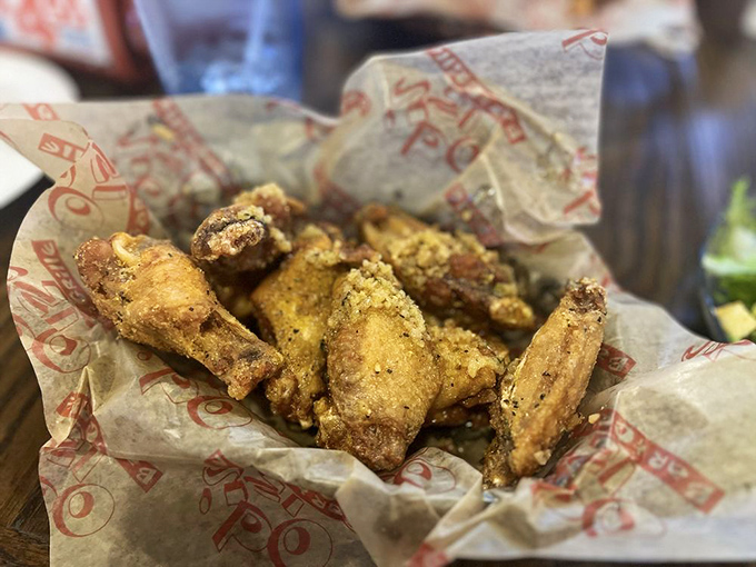 Garlic wings that announce themselves before they arrive. Your taste buds will thank you; your date might need some convincing.