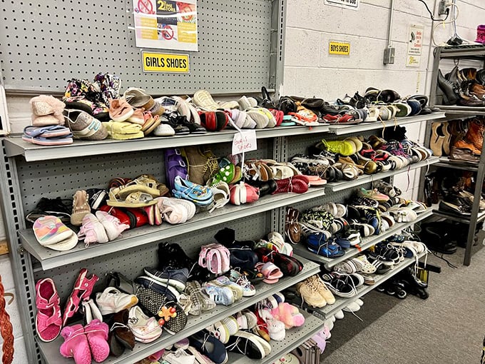Tiny shoes with big personality line these shelves, each pair telling stories of first steps, playground adventures, and growth spurts that came too soon.