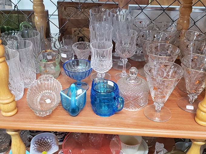 Crystal and colored glass catch the light like captured rainbows from dinner parties of yesteryear.